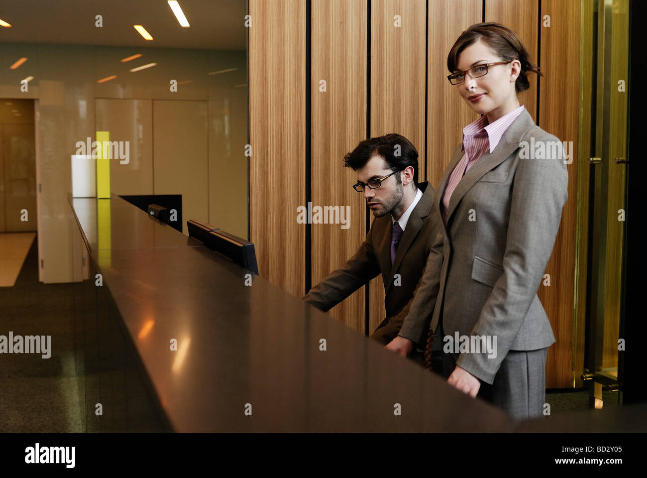 woman and man at reception Stock Photo - Alamy