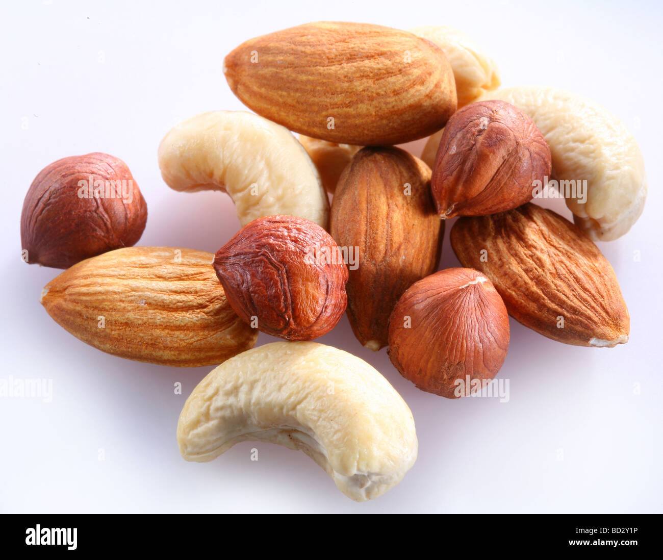 Nuts on a white background Stock Photo - Alamy