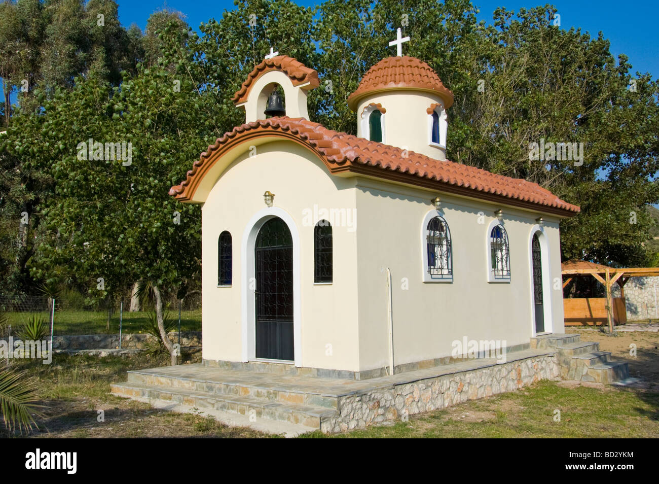 Small church at Mounda beach near Skala on the Greek Mediterranean ...