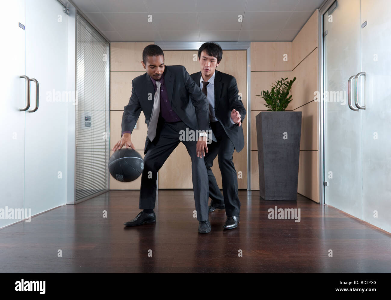 Multi ethnic group playing in office hi-res stock photography and ...