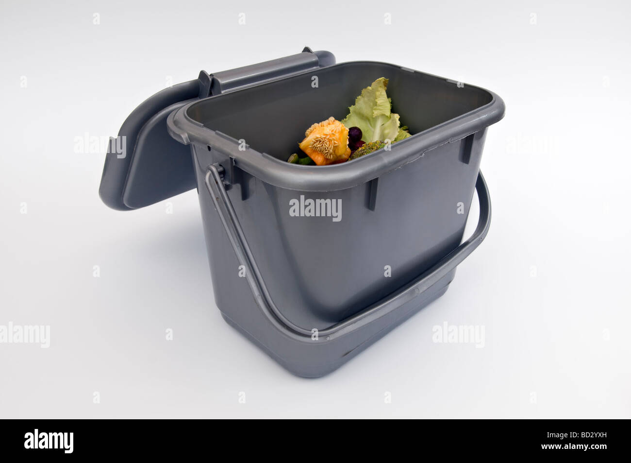 Kitchen compost caddy against white background Stock Photo - Alamy