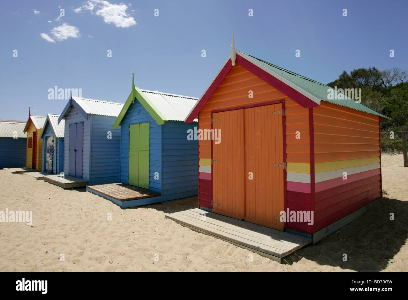 Brightly decorated beach boxes, Brighton Beach, Melbourne, Victoria ...