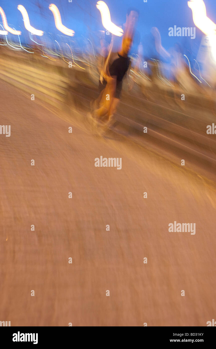 blurred picture of man running southbank london uk Stock Photo - Alamy