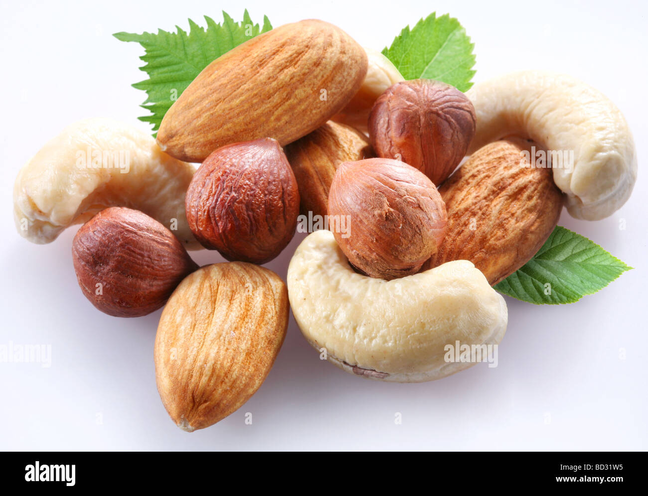 Nuts on a white background Stock Photo - Alamy