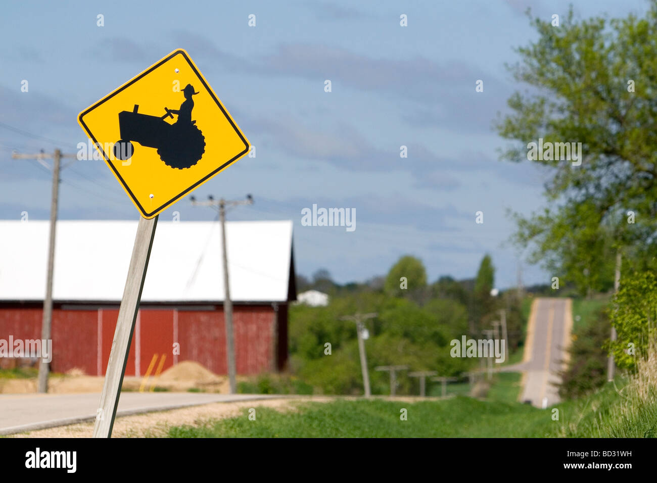 Tractor crossing road sign in Sauk County Wisconsin USA Stock Photo - Alamy