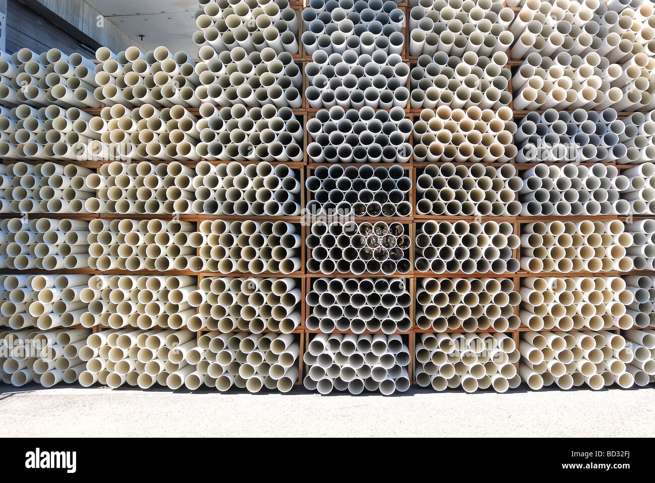 Stacked PVC piping Stock Photo - Alamy