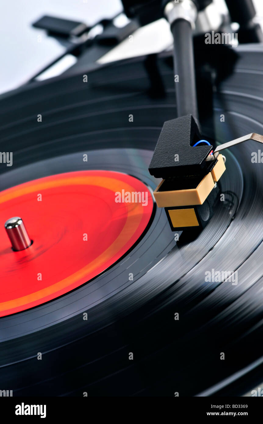 Vinyl record spinning on turntable close up Stock Photo - Alamy