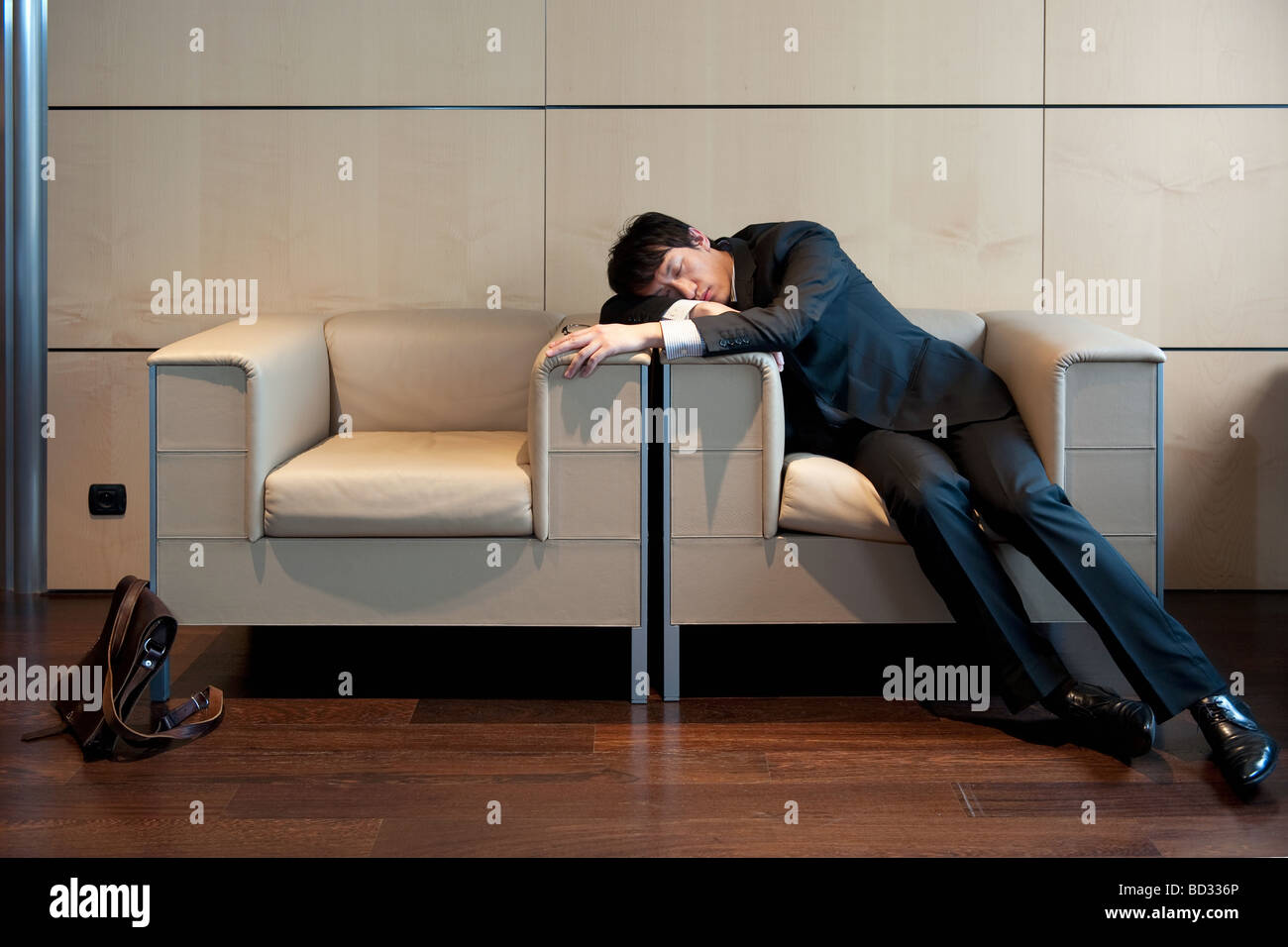 Man dozing in armchair hi-res stock photography and images - Alamy