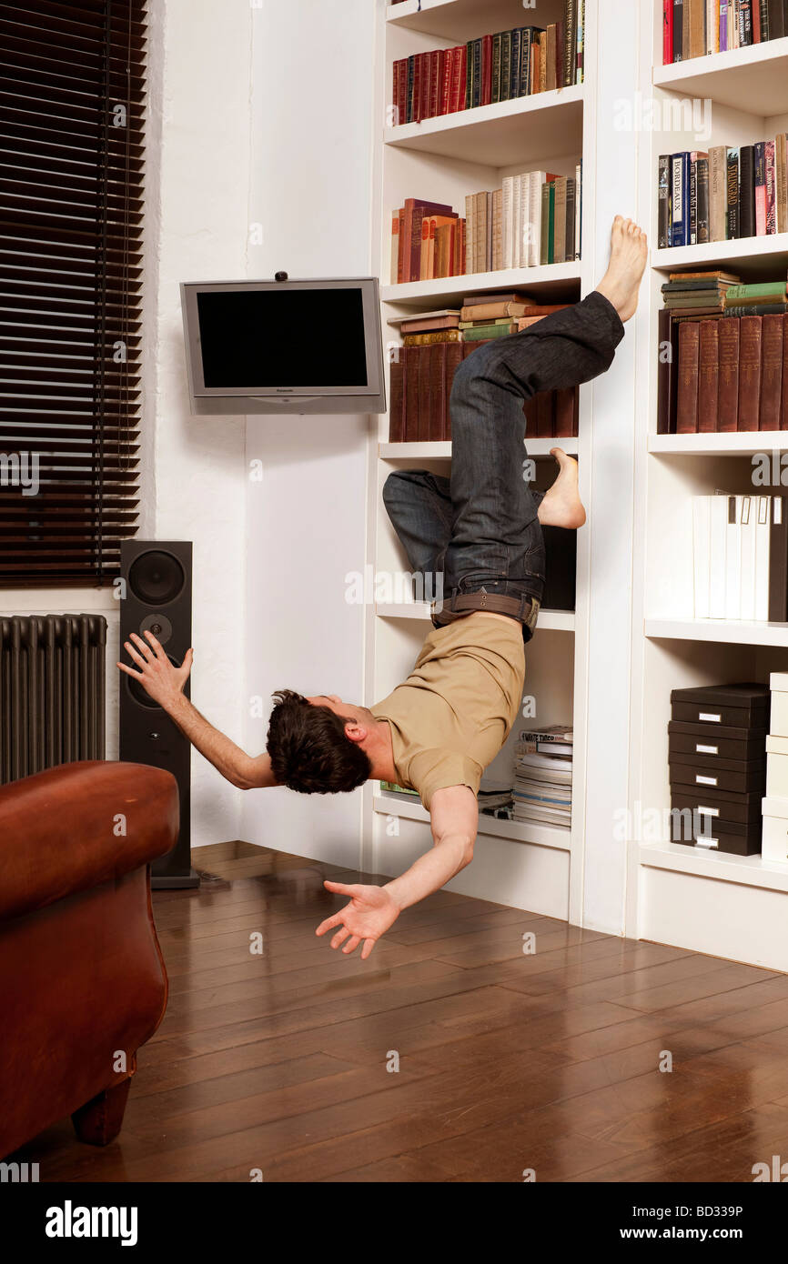 man tumbling against wall Stock Photo - Alamy