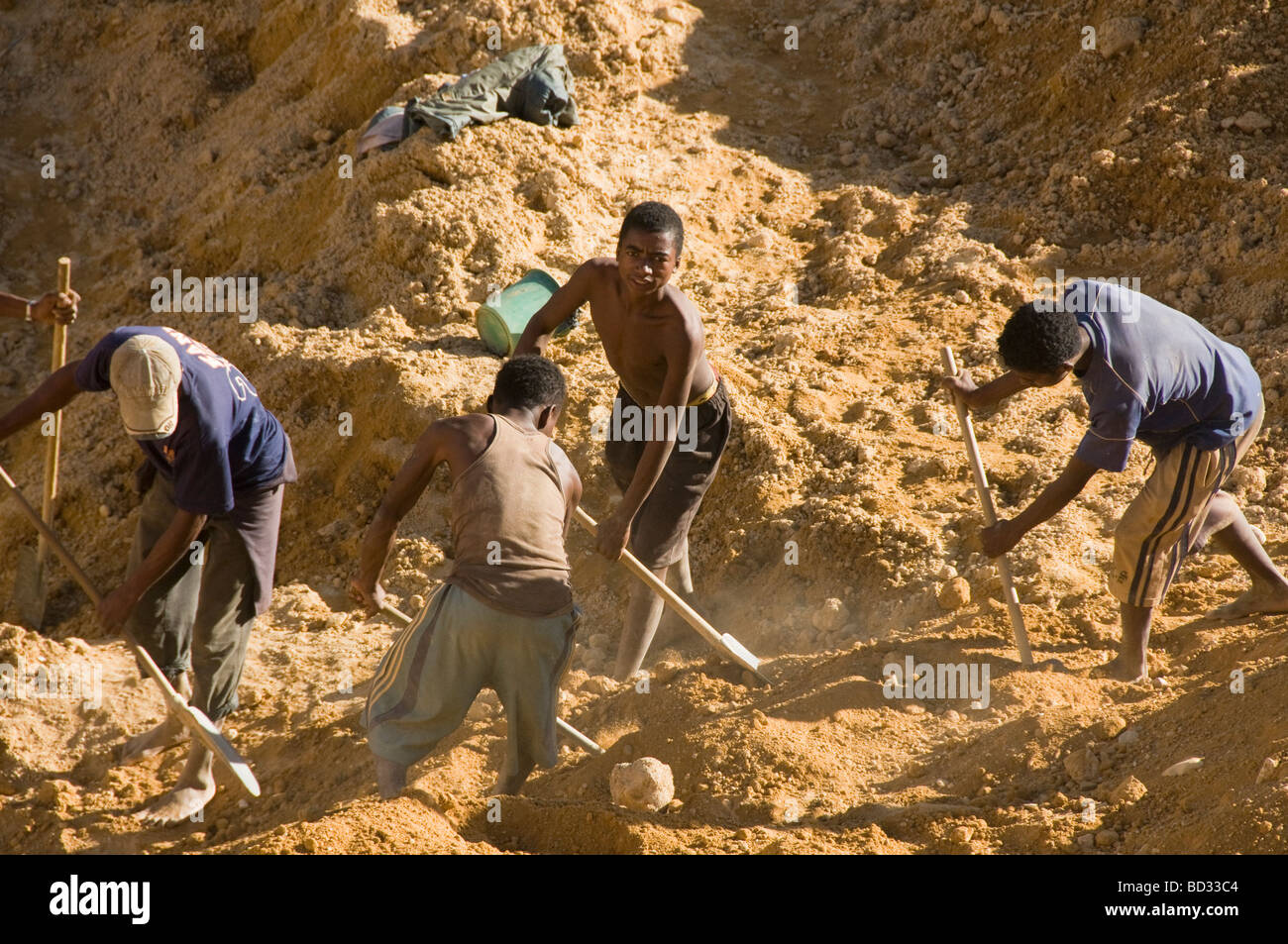 laborers digging for sapphires in the mines of Ilakaka in Madagascar ...
