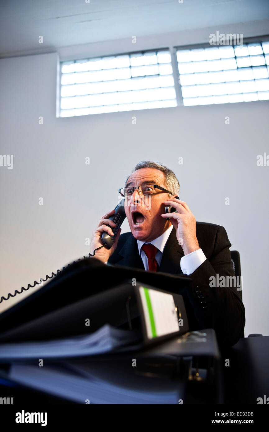 Person speaking angrily on phone hi-res stock photography and images ...