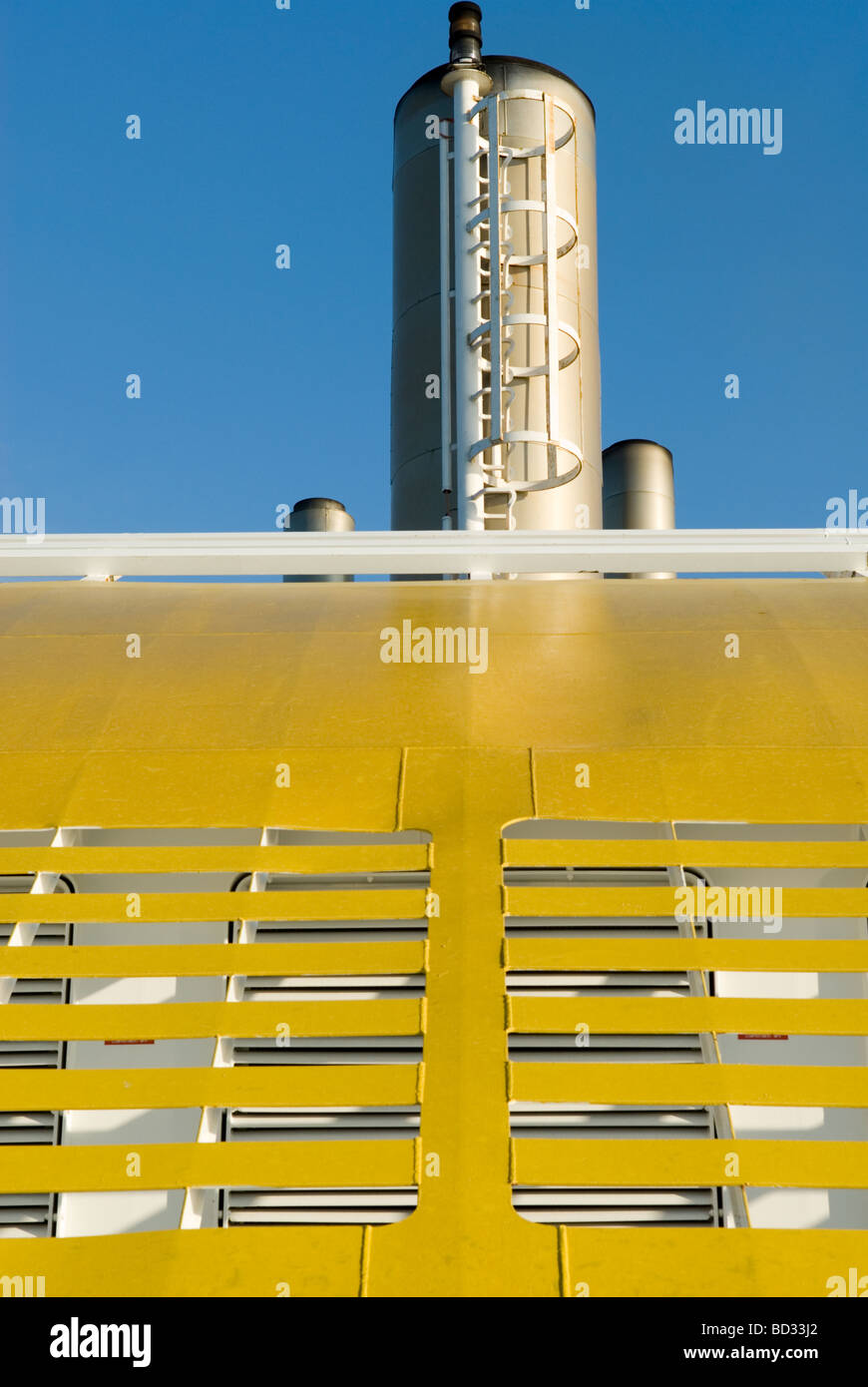 silver funnel with exhaust pipe of engine with blue sky Stock Photo - Alamy