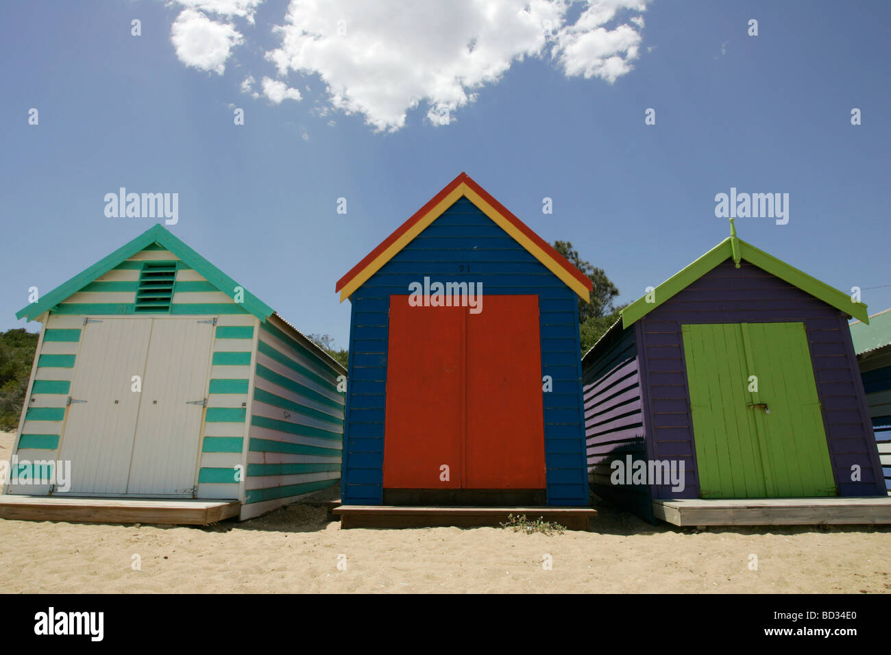 Brightly decorated beach boxes, Brighton Beach, Melbourne, Victoria ...