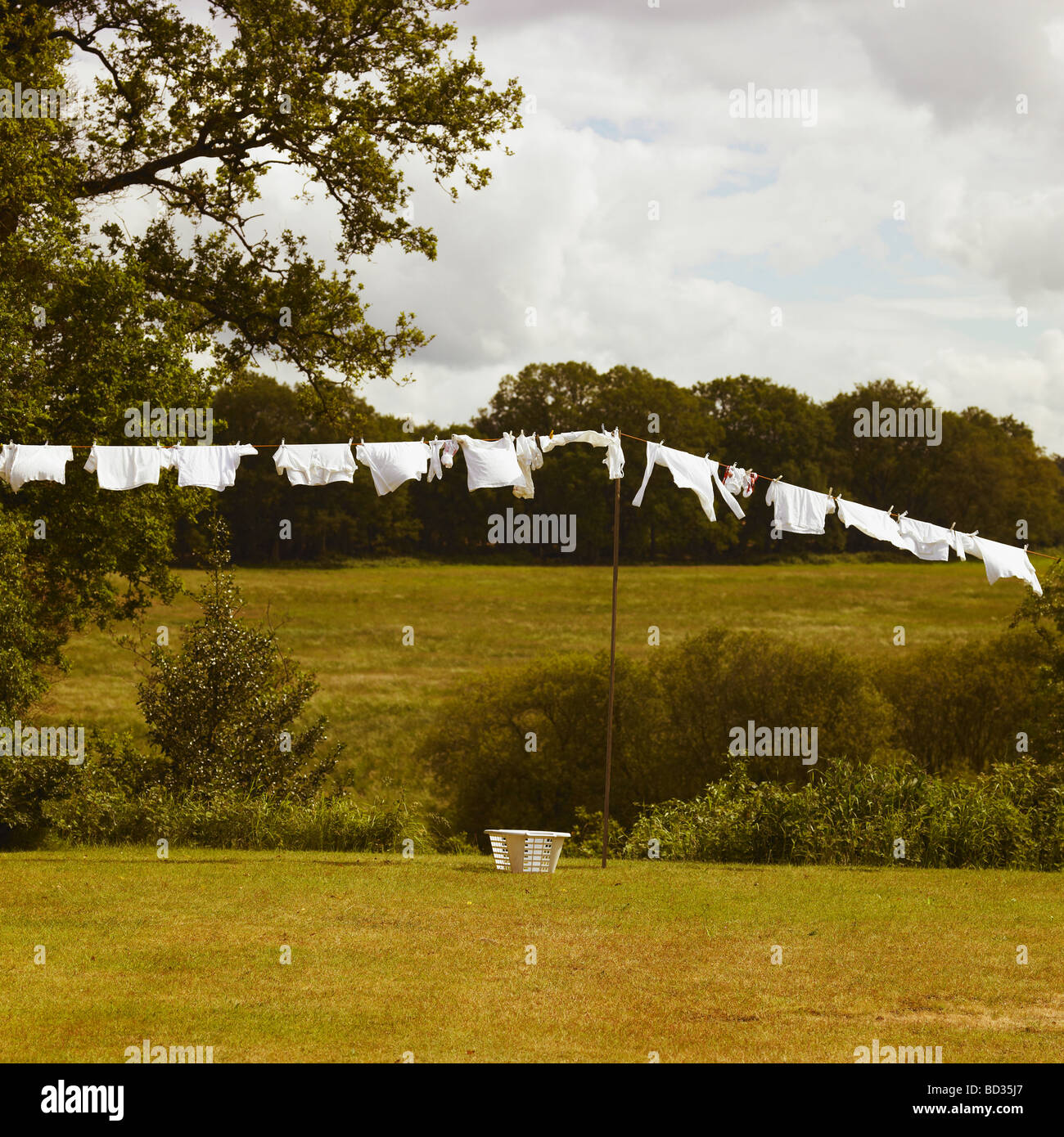Family Washing Line with White Laundry Stock Photo - Alamy