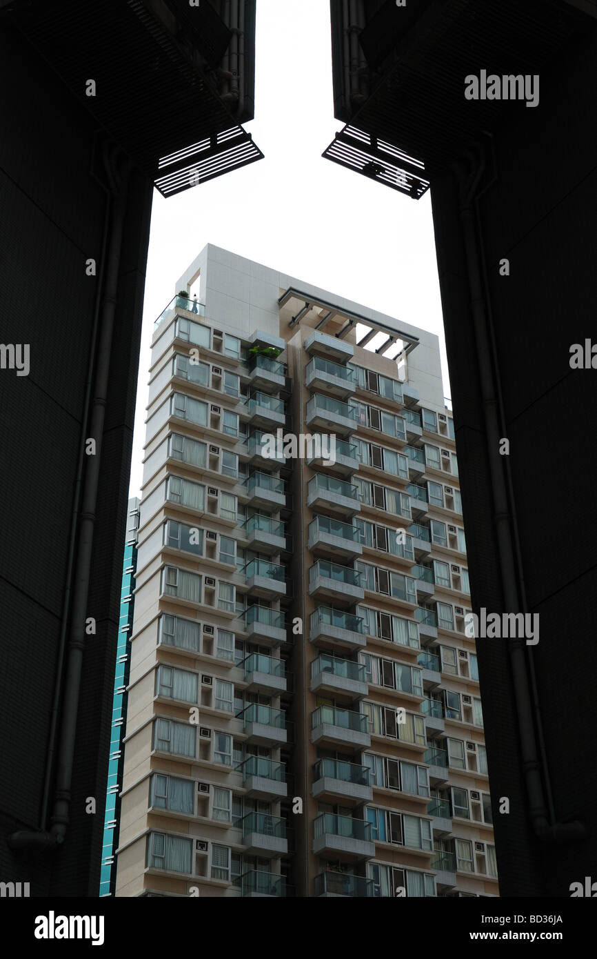 Narrow view of a skyscraper in Sheung Wan Stock Photo - Alamy