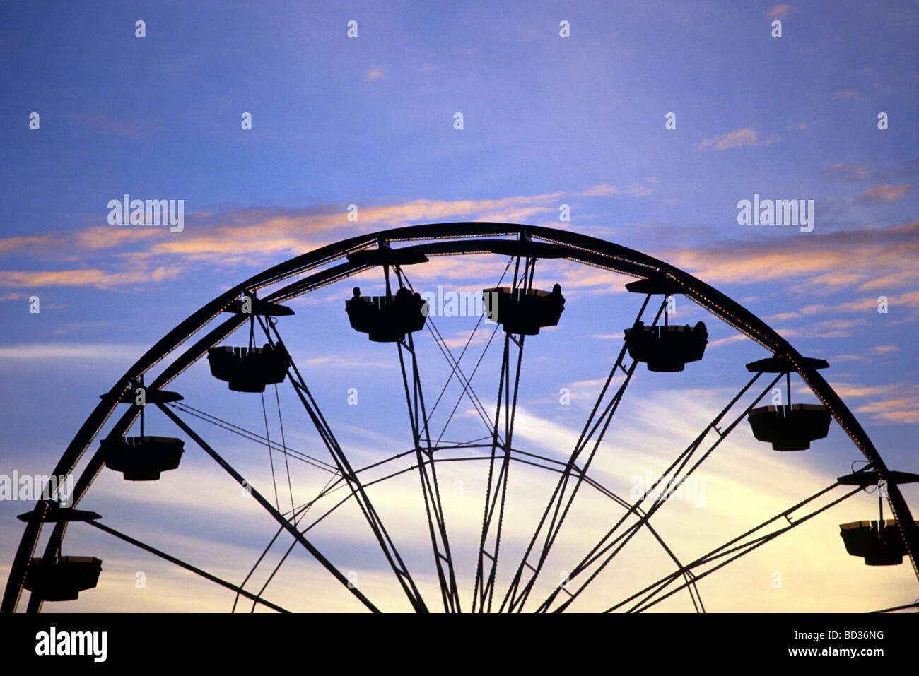 Ferris Wheel and Sunset Sky Stock Photo - Alamy