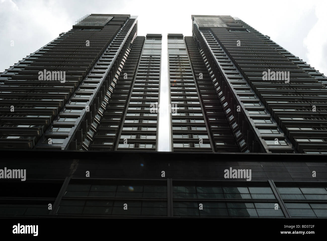 Bottom view of a skyscraper in Hong Kong Stock Photo - Alamy