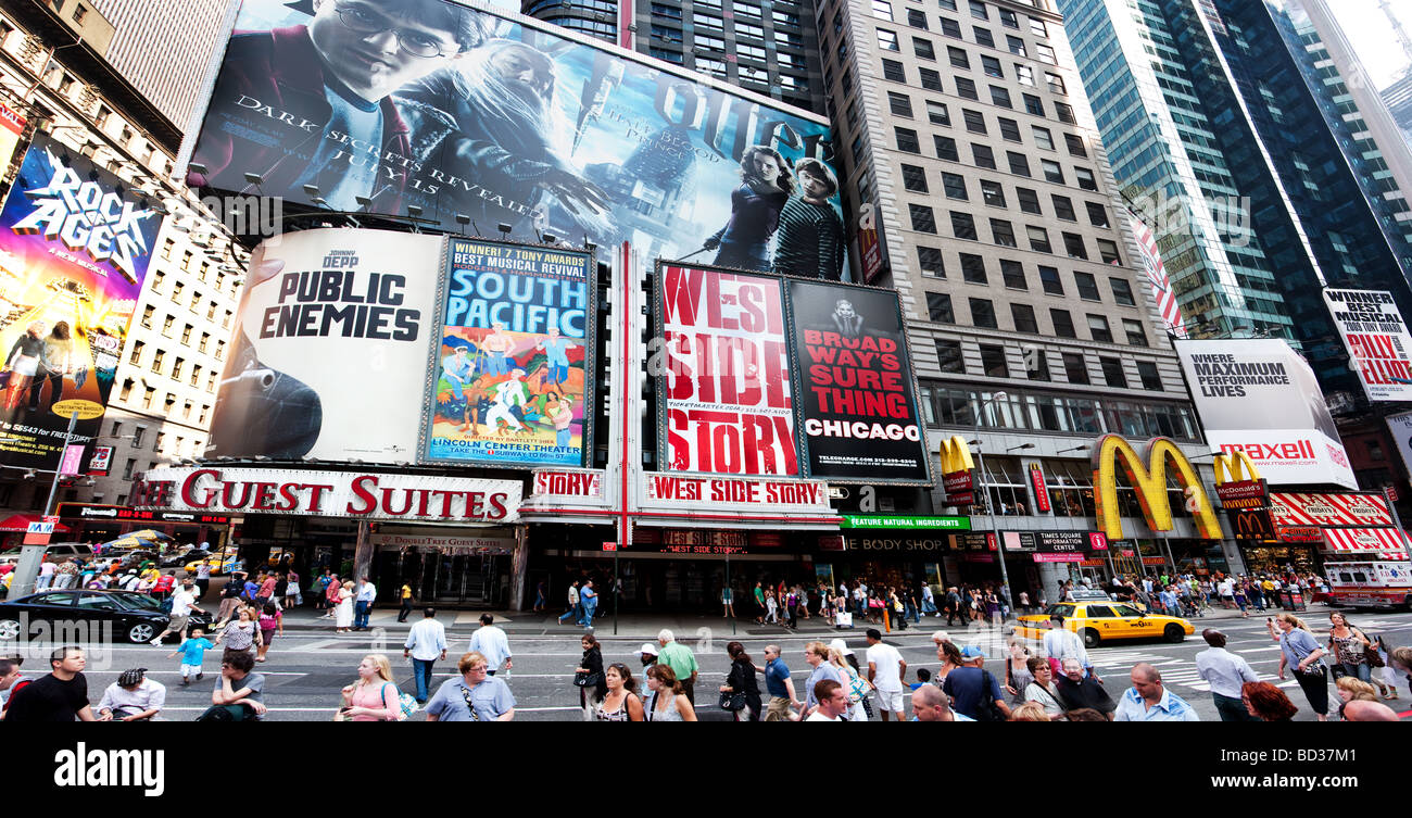 Corner of Times Square at 7th Avenue showing advertisement billboards for Broadway shows in ...