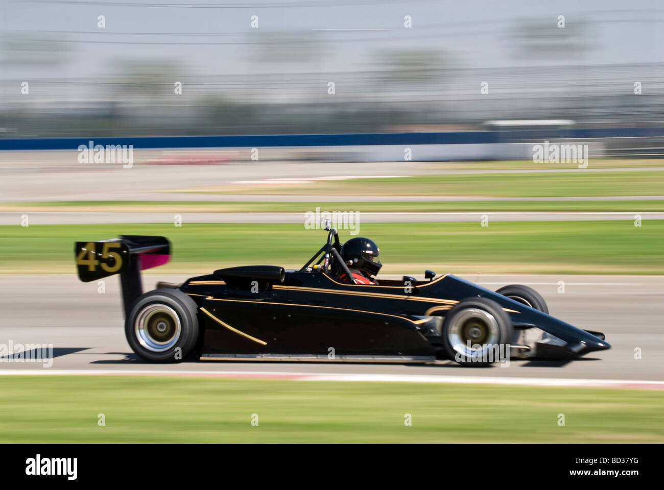 A 1987 Martini Super Vee competes at a vintage racing event Stock Photo ...