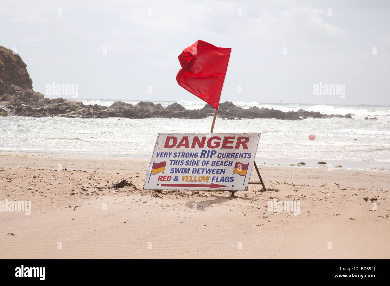 Lifeguard flags at Bantham Beech Devon England Stock Photo - Alamy