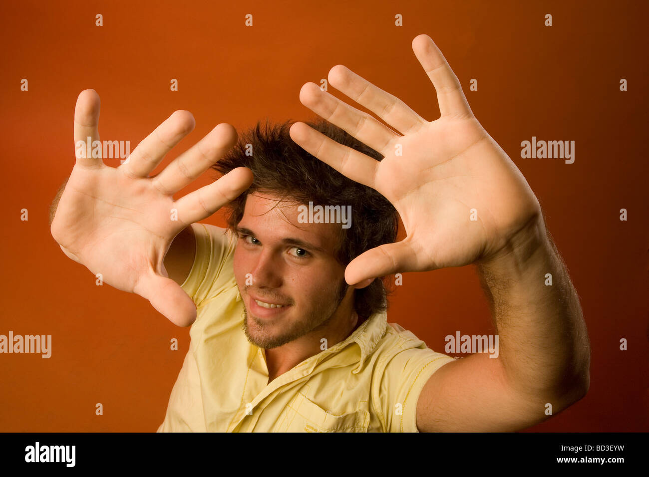 young man stretching out her hands Stock Photo - Alamy