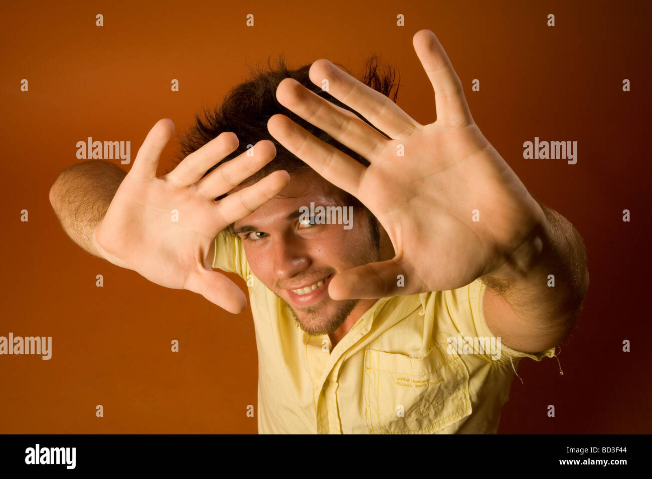 young man stretching out her hands Stock Photo - Alamy