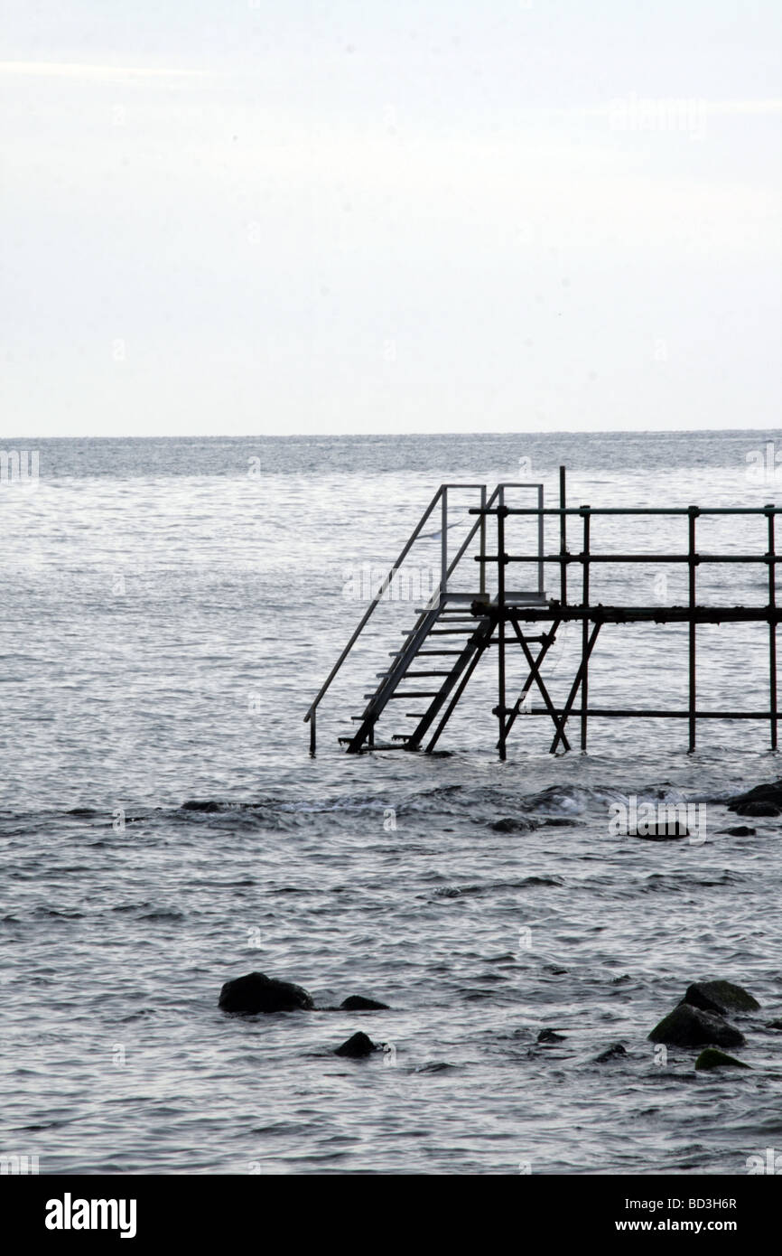 one empty jetty with steps in sea Stock Photo - Alamy
