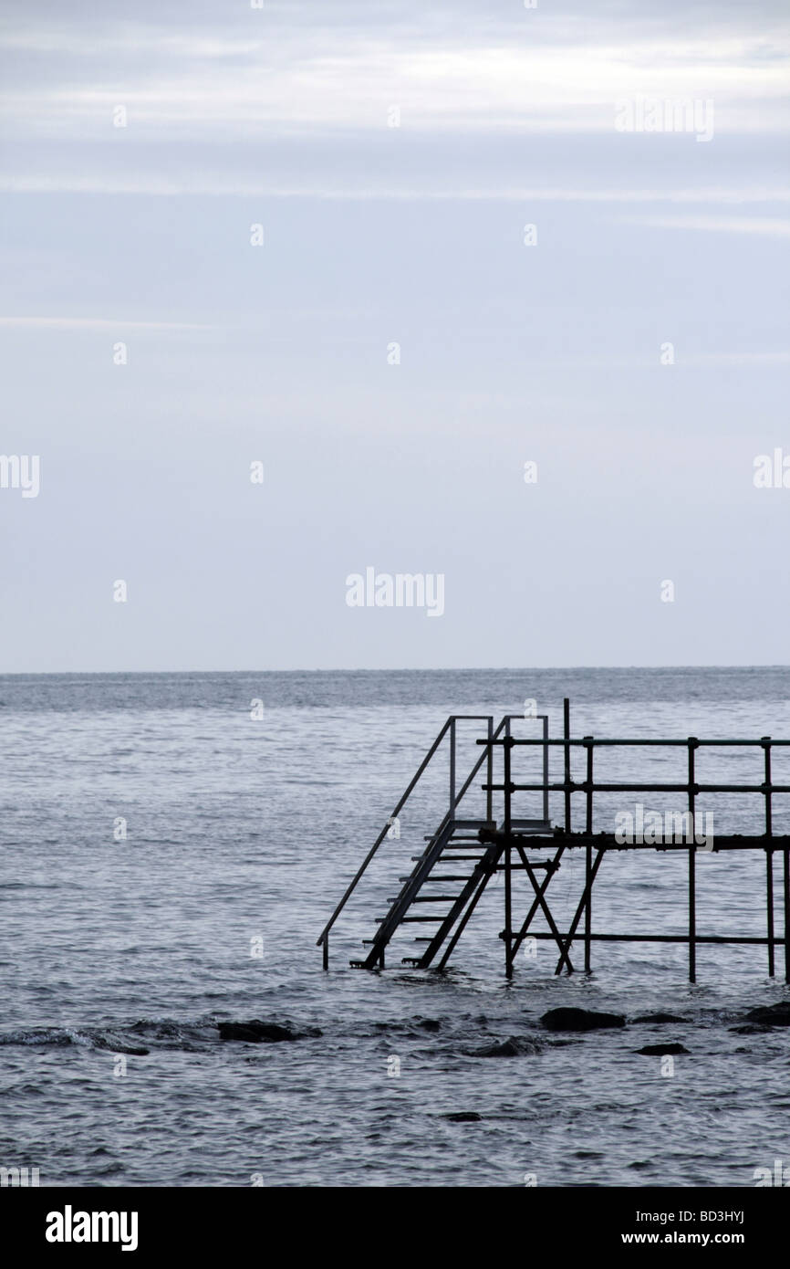 one empty jetty with steps in sea Stock Photo - Alamy