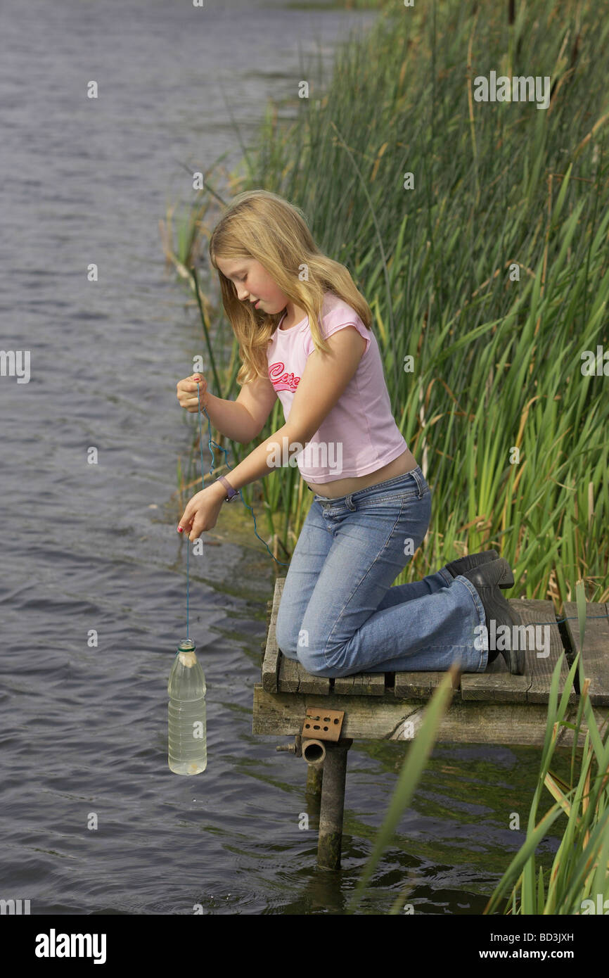 Taking water sample teenager hi-res stock photography and images - Alamy