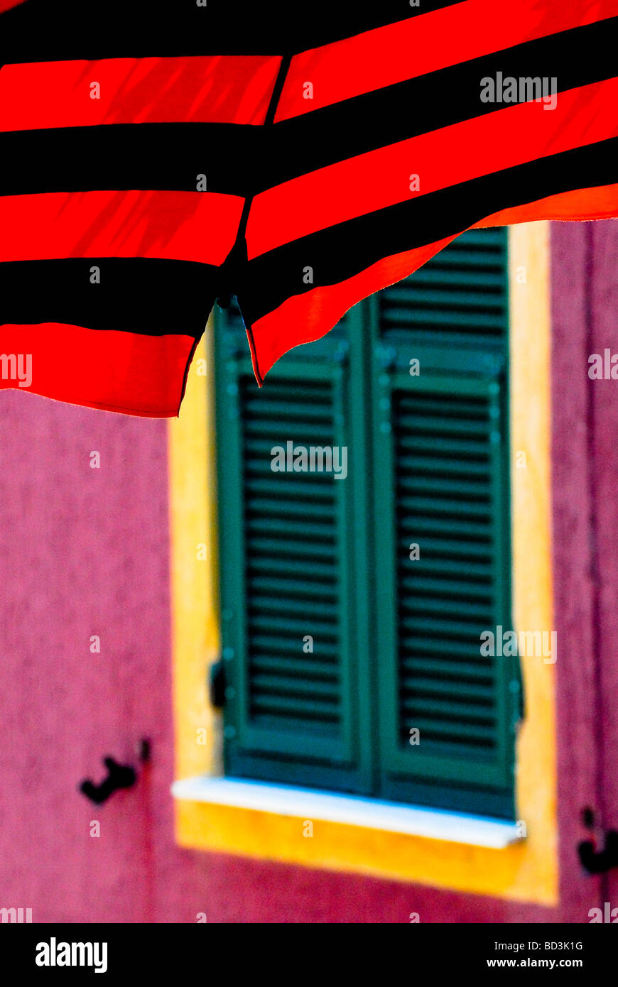 Seaside colours of umbrella and window shutters, Vernazza, Cinque Terre ...