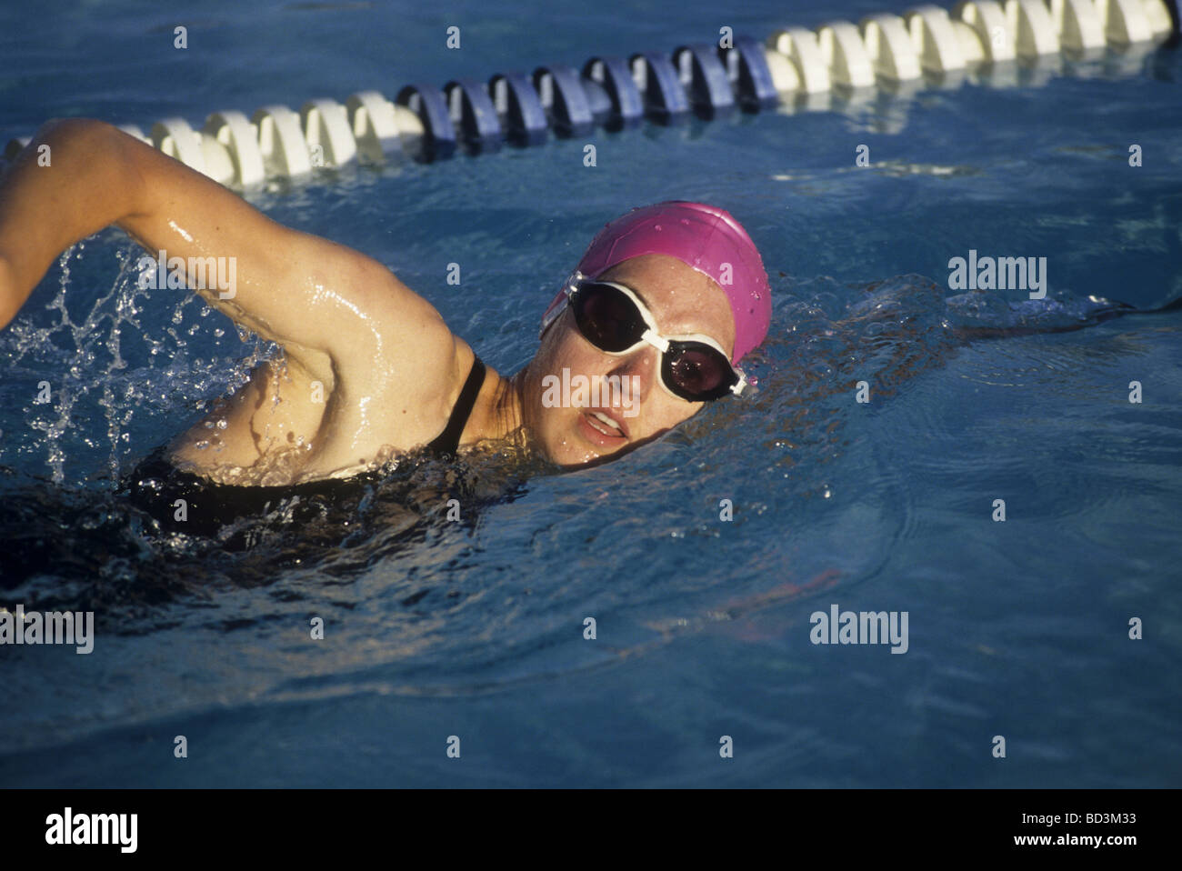 Female swimmer in action Stock Photo - Alamy