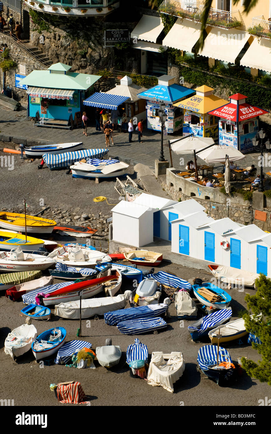 Fishing boats and ticket booths on the beach at Positano, Amalfi Coast ...