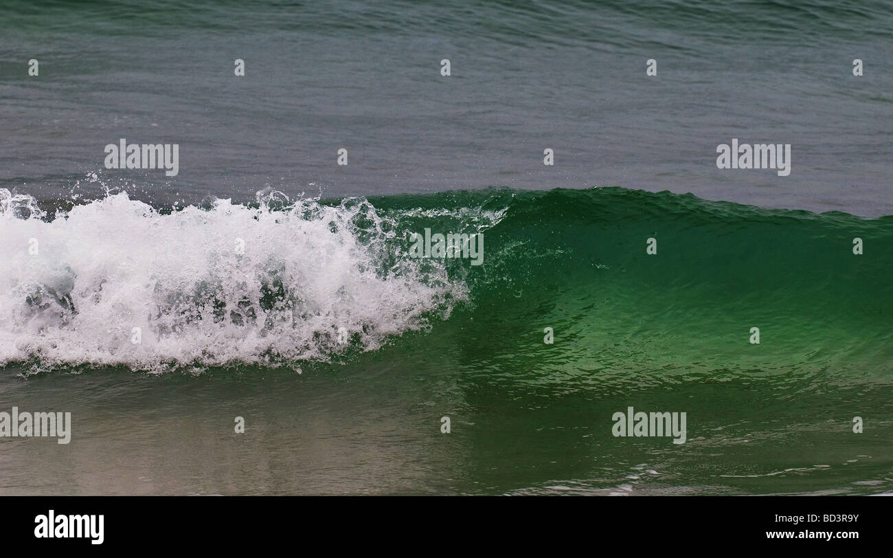 Incoming wave at Sennen Stock Photo - Alamy