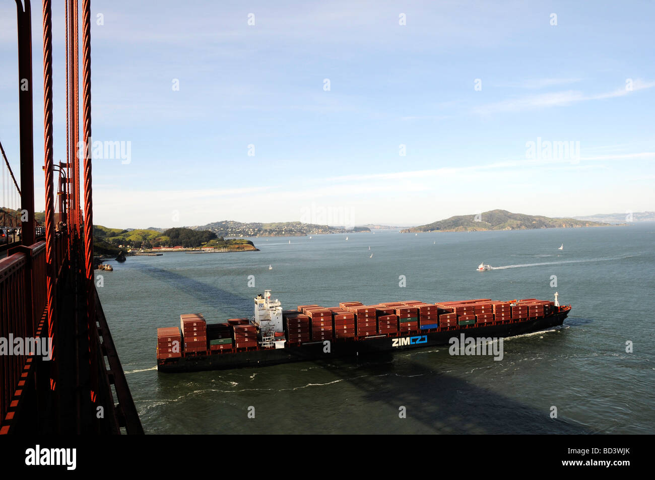 Massive container ship passes into the San Francisco Bay under the ...