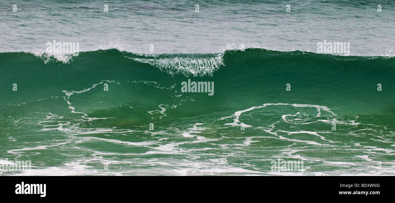 Incoming wave at Sennen Stock Photo - Alamy