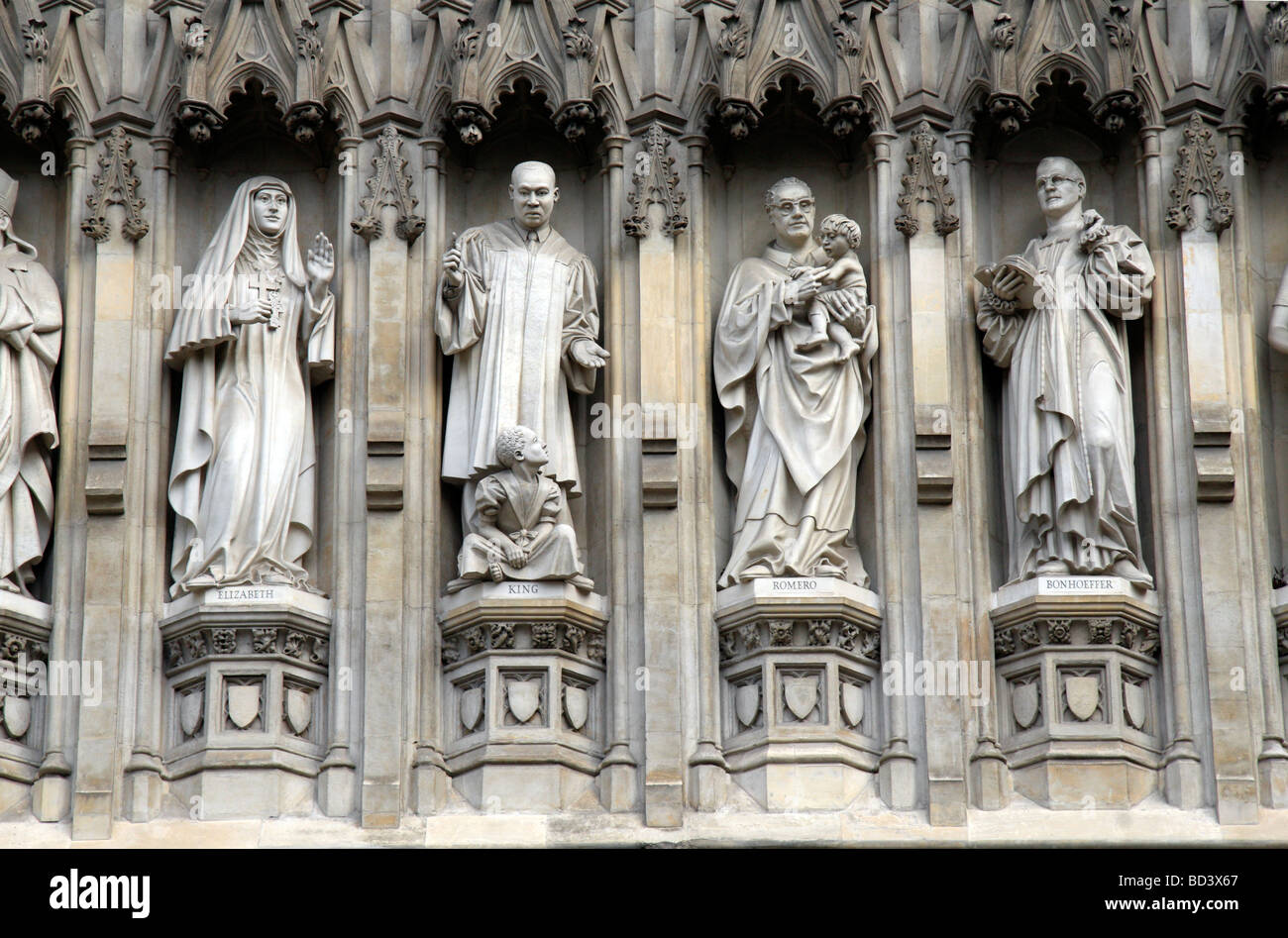 A close up of a section of sculptures above the main entrance to ...