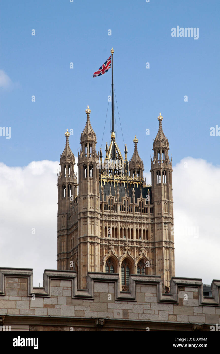 The Victoria Tower of the Palace of Westminster (Houses of Parliament) viewed over a parapet of ...
