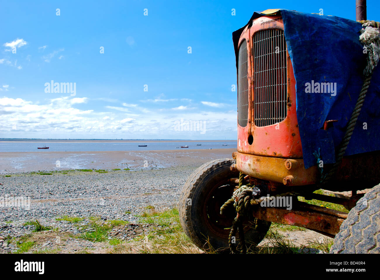 Tractor on beach Stock Photo - Alamy