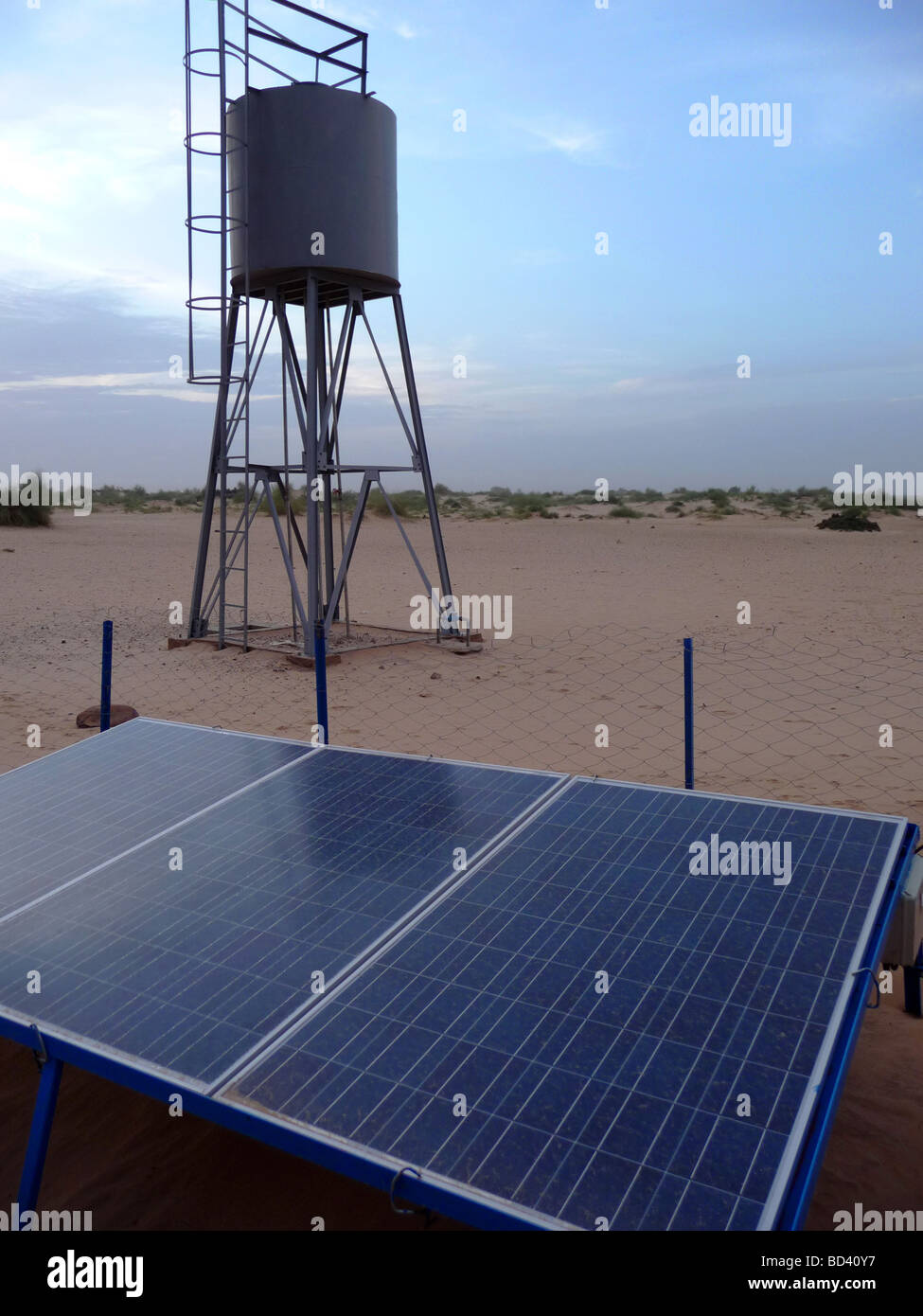 A solar powered borehole in the desert Stock Photo - Alamy