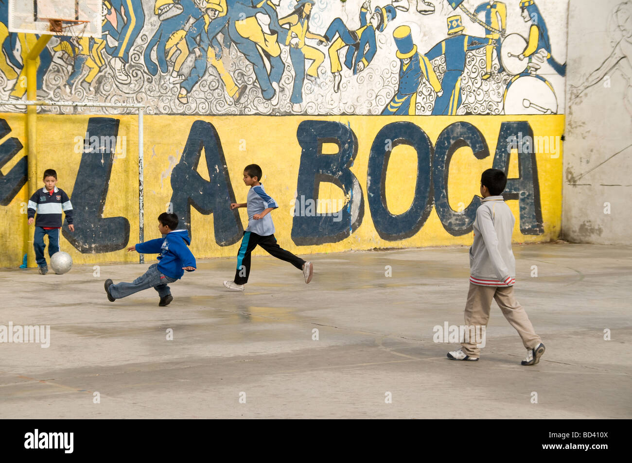 Kids playing football in La Boca neighbourhood, Buenos Aires, Argentina ...