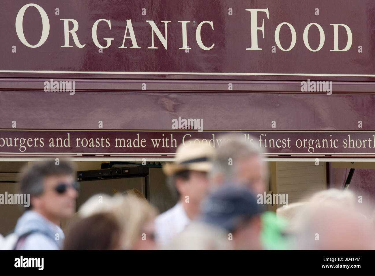 Crowds With An Organic Food Sign Stock Photo - Alamy