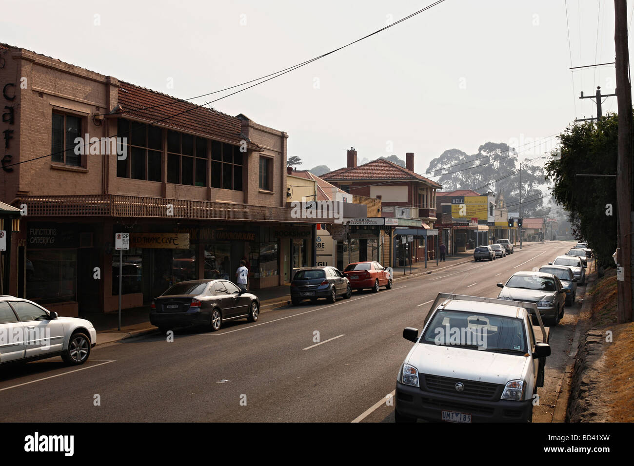 Bushfire smoke haze and the main street of Warburton Victoria Australia ...
