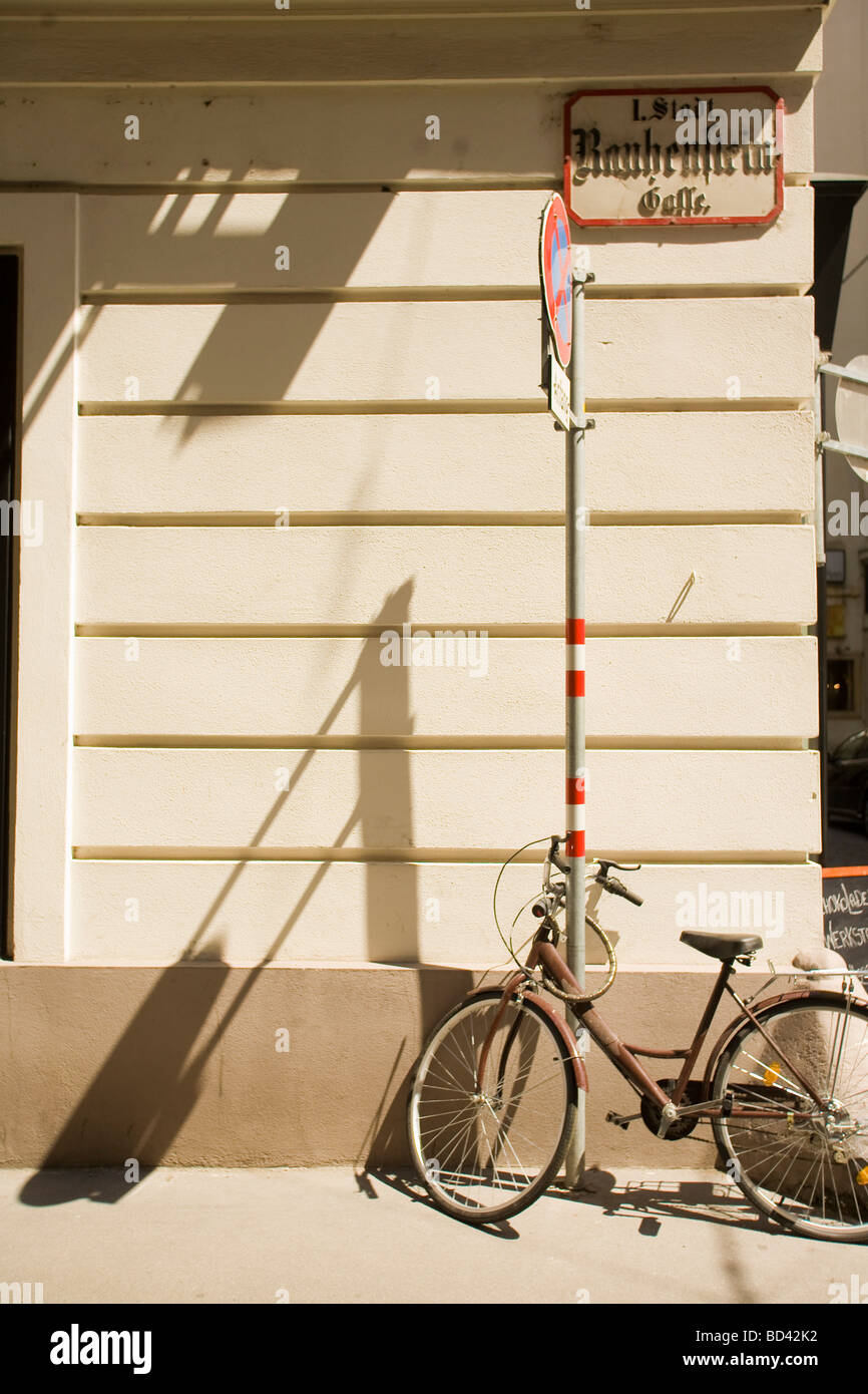Vienna City attractions, old style wall and bike with Austrian street ...