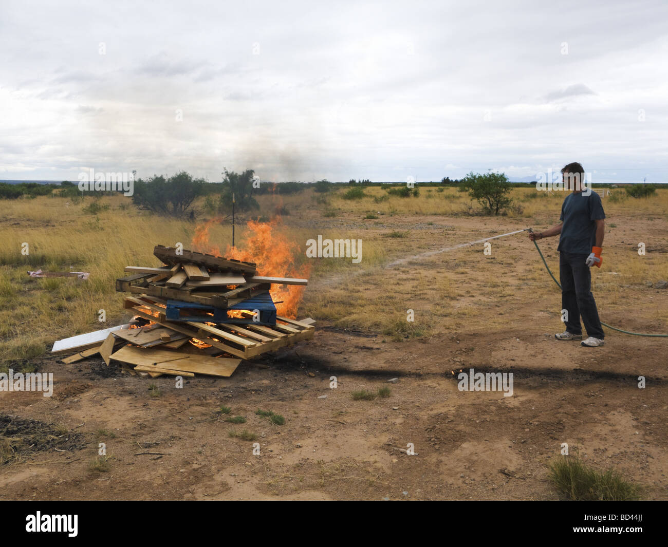 Man controlling fire Stock Photo - Alamy
