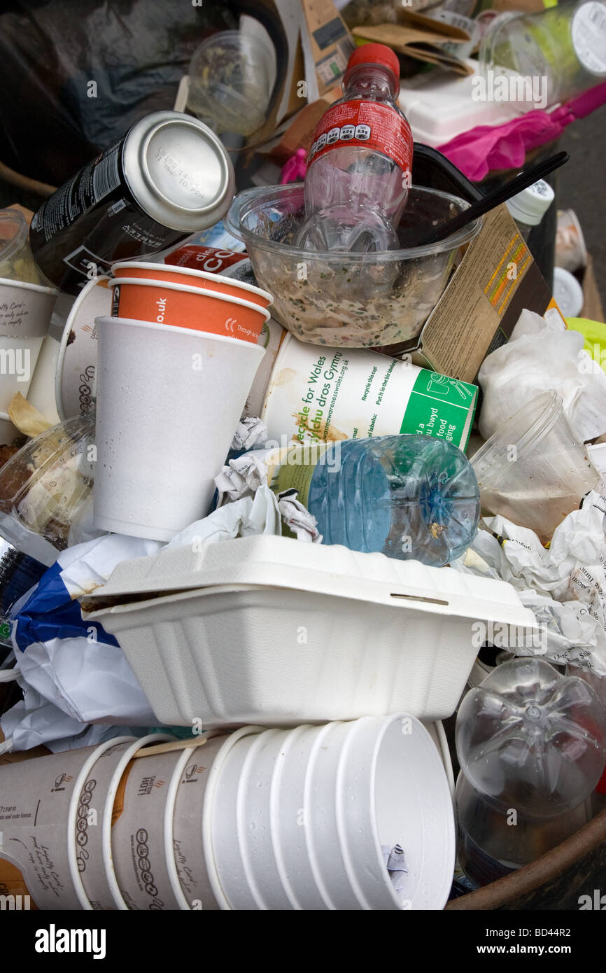 Litter in a litter bin Stock Photo - Alamy