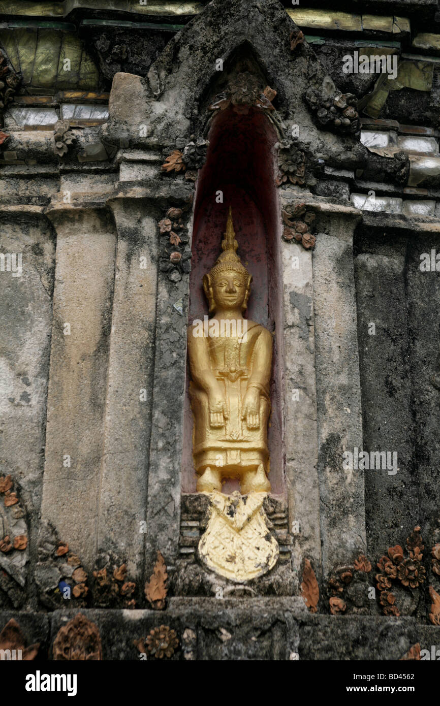 Luang Prabang, Laos, 2006 : A gold painted Buddha statue stands in a ...