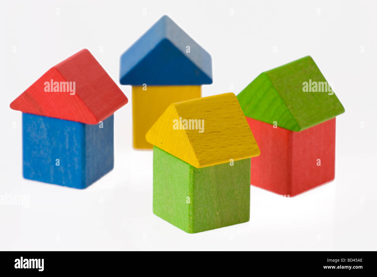 Wooden toy blocks on white background Stock Photo - Alamy