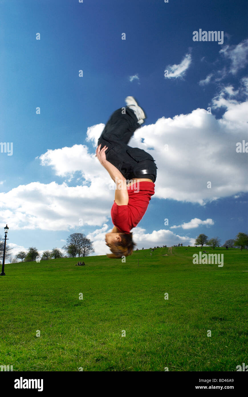 man backflipping in park Stock Photo - Alamy
