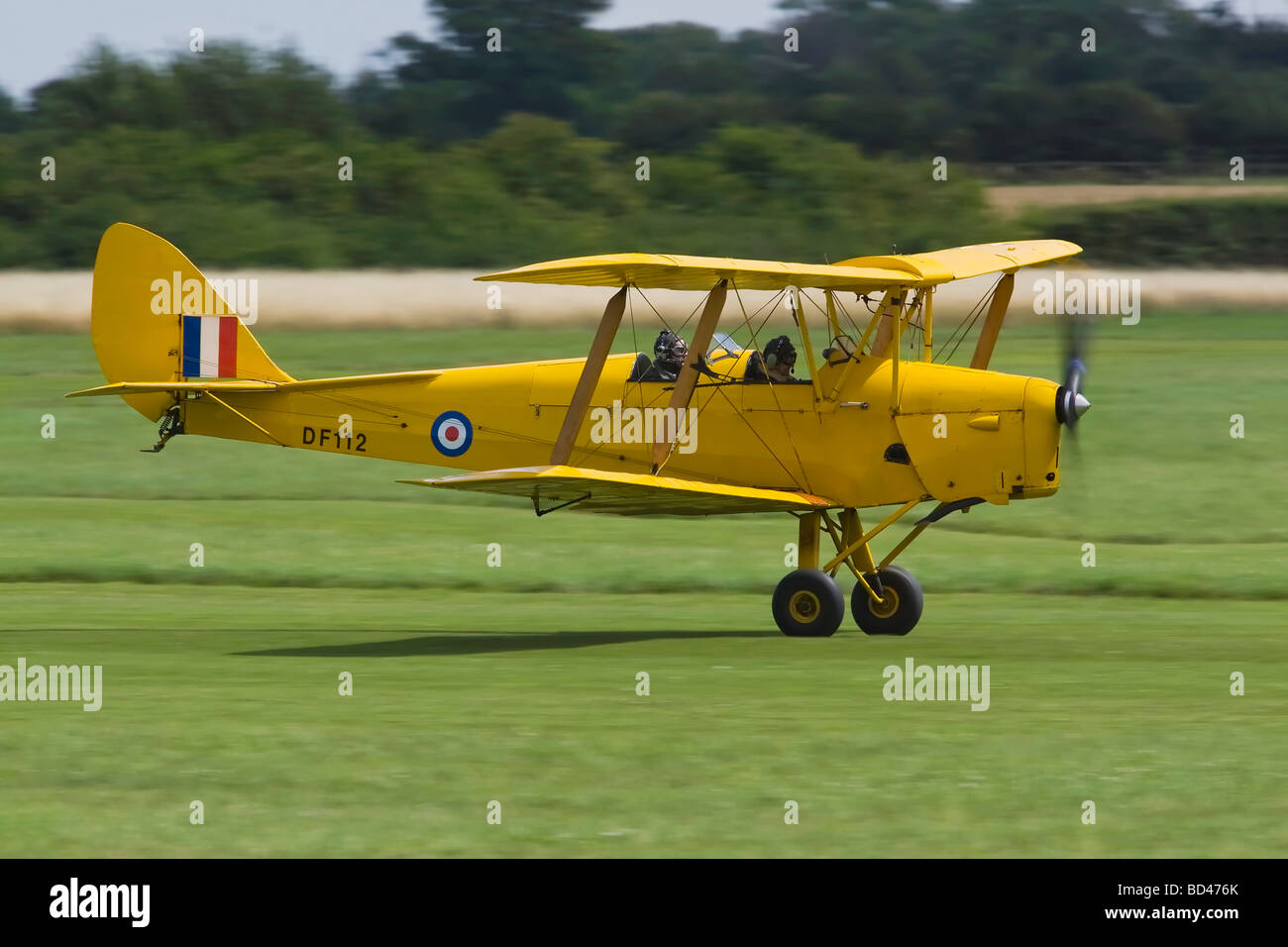 An RAF De Havilland DH82 Tiger Moth biplane trainer Stock Photo - Alamy