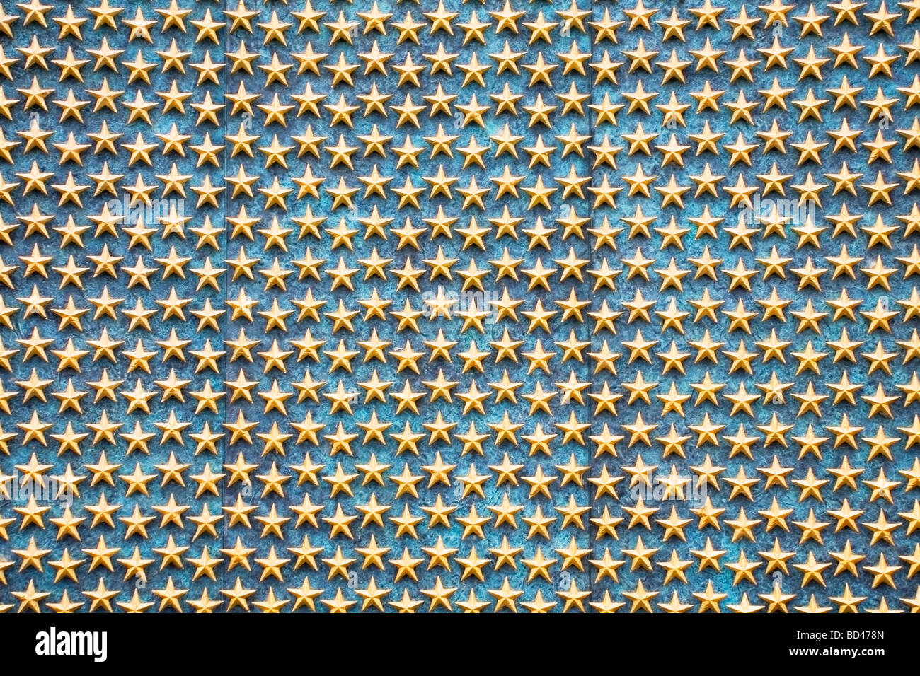 Rows of gold stars on a blue background Stock Photo - Alamy
